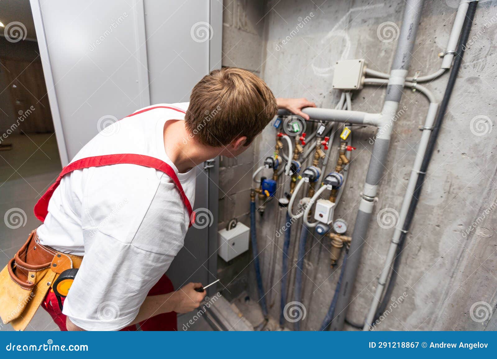 Plumber Installing Pressure Meter for House Heating System Stock Image ...