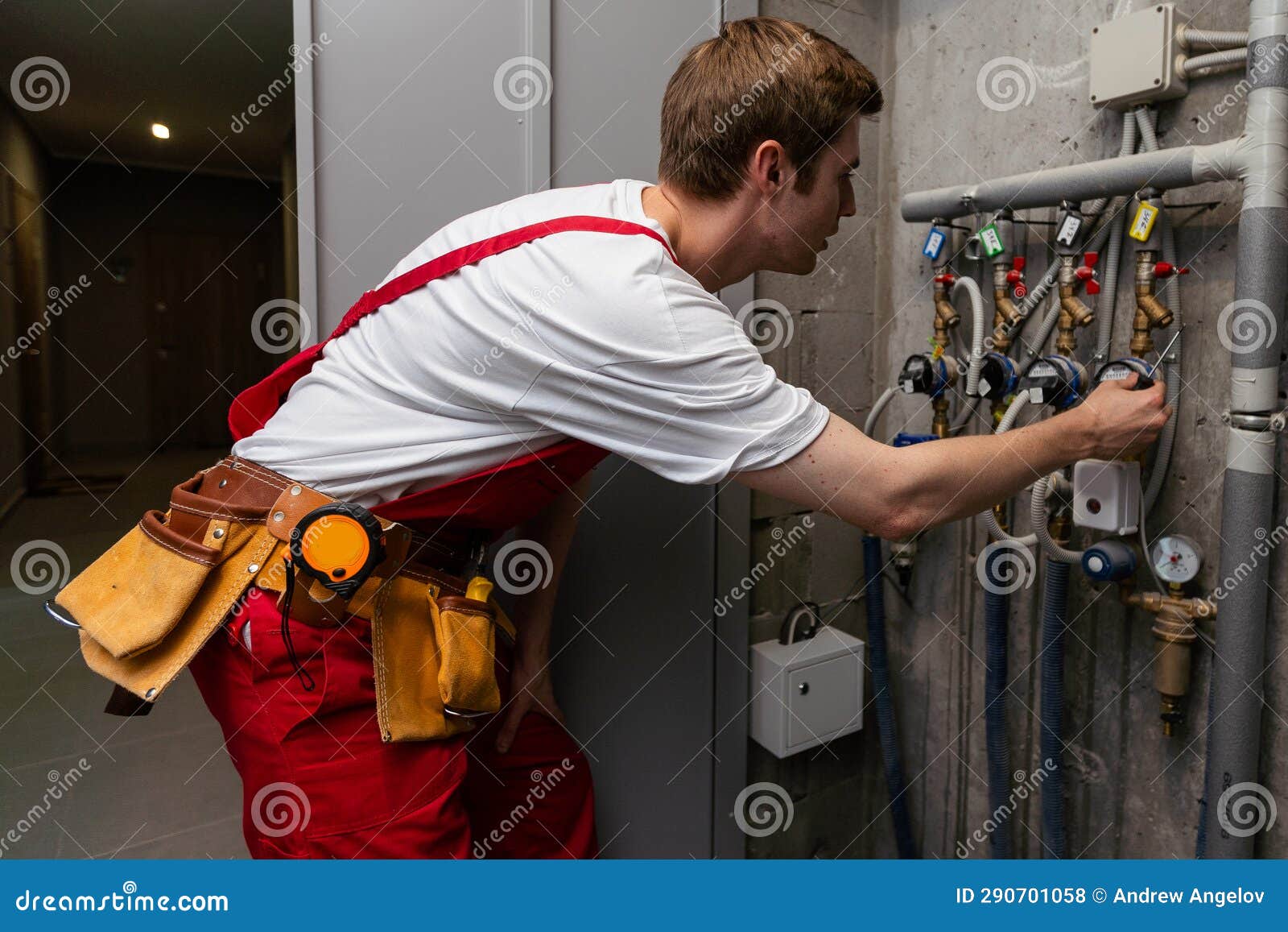 Plumber Installing Pressure Meter for House Heating System Stock Photo ...