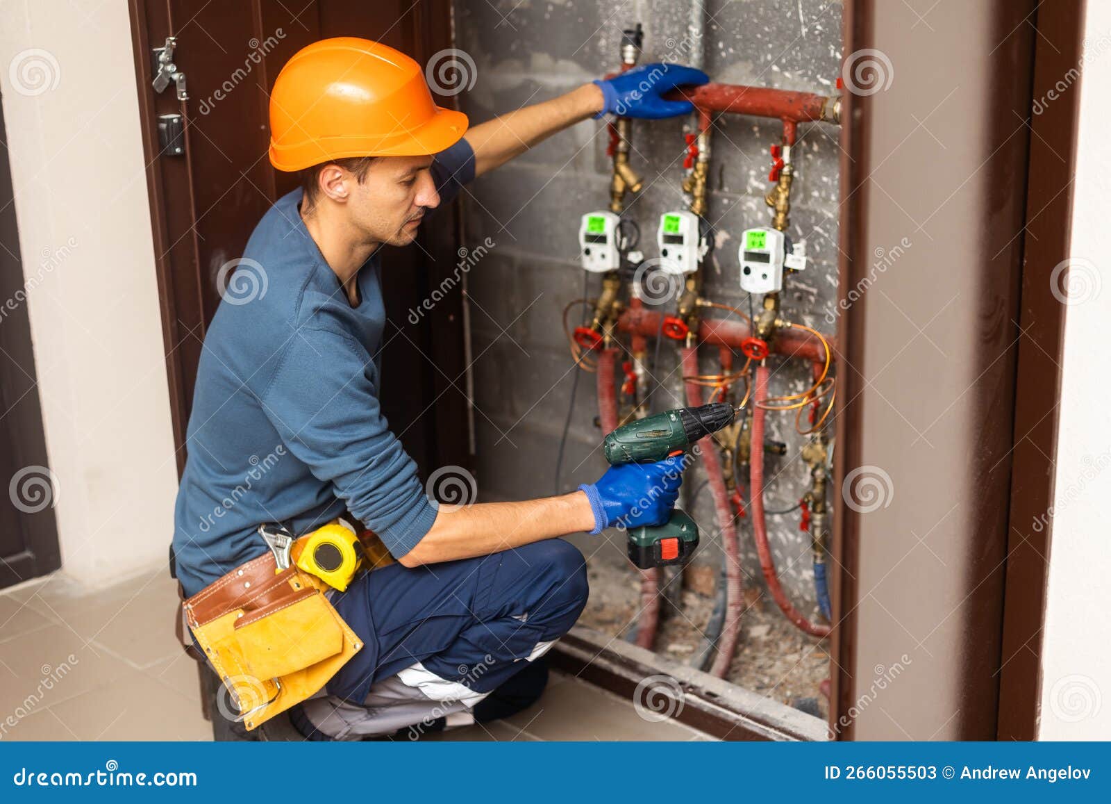 Plumber Installing Pressure Meter for House Heating System Stock Image ...