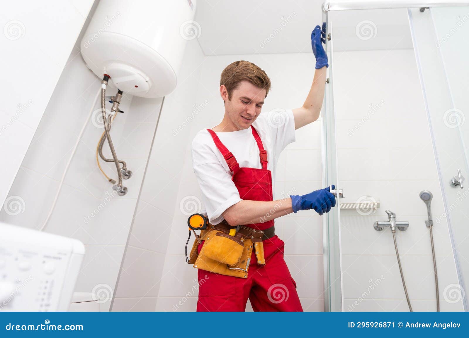 Plumber Installing a Shower Cabin in Bathroom Stock Image - Image of ...
