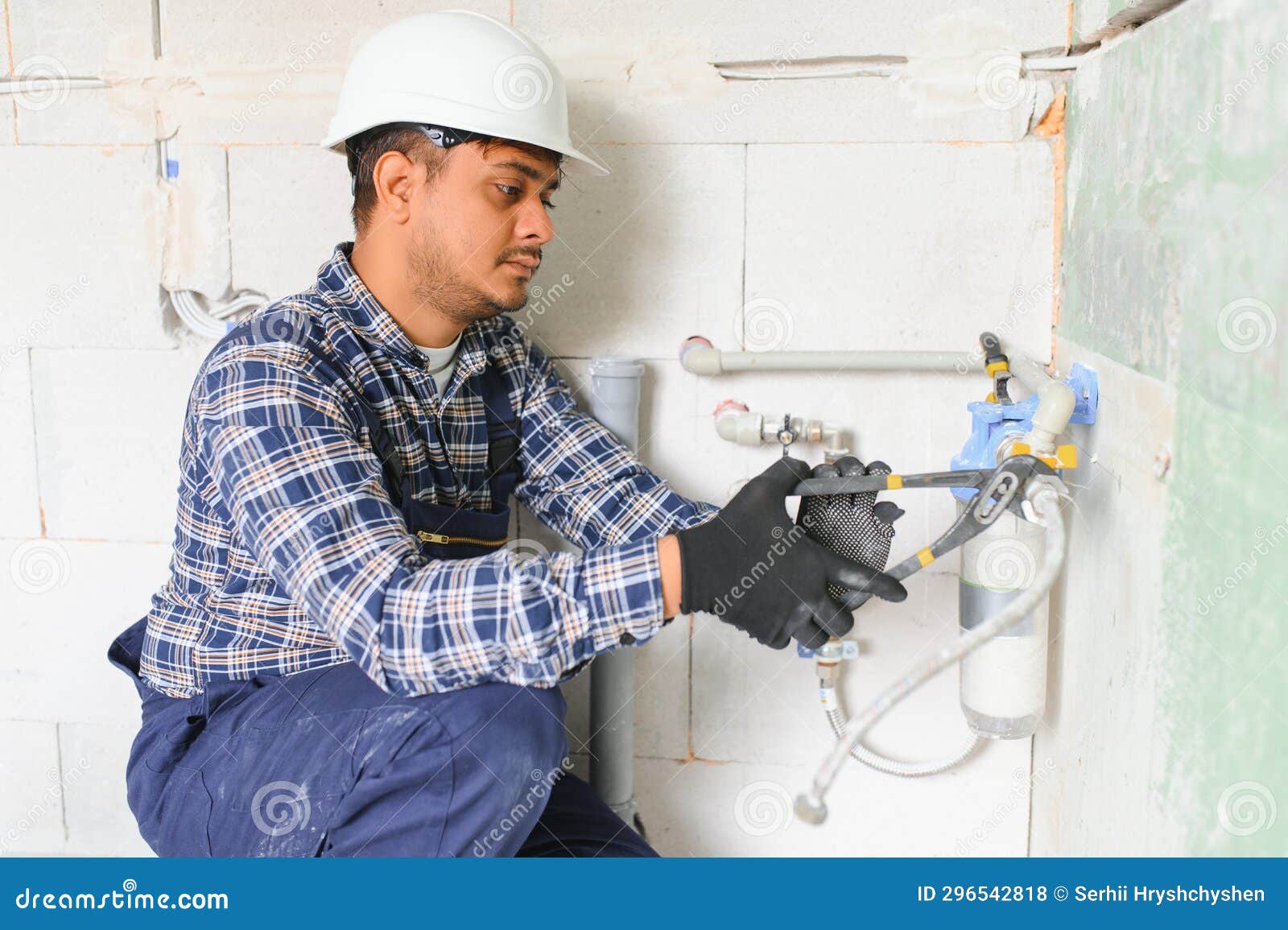 Indian Plumber Installing Water Equipment - Meter, Filter and Pressure ...