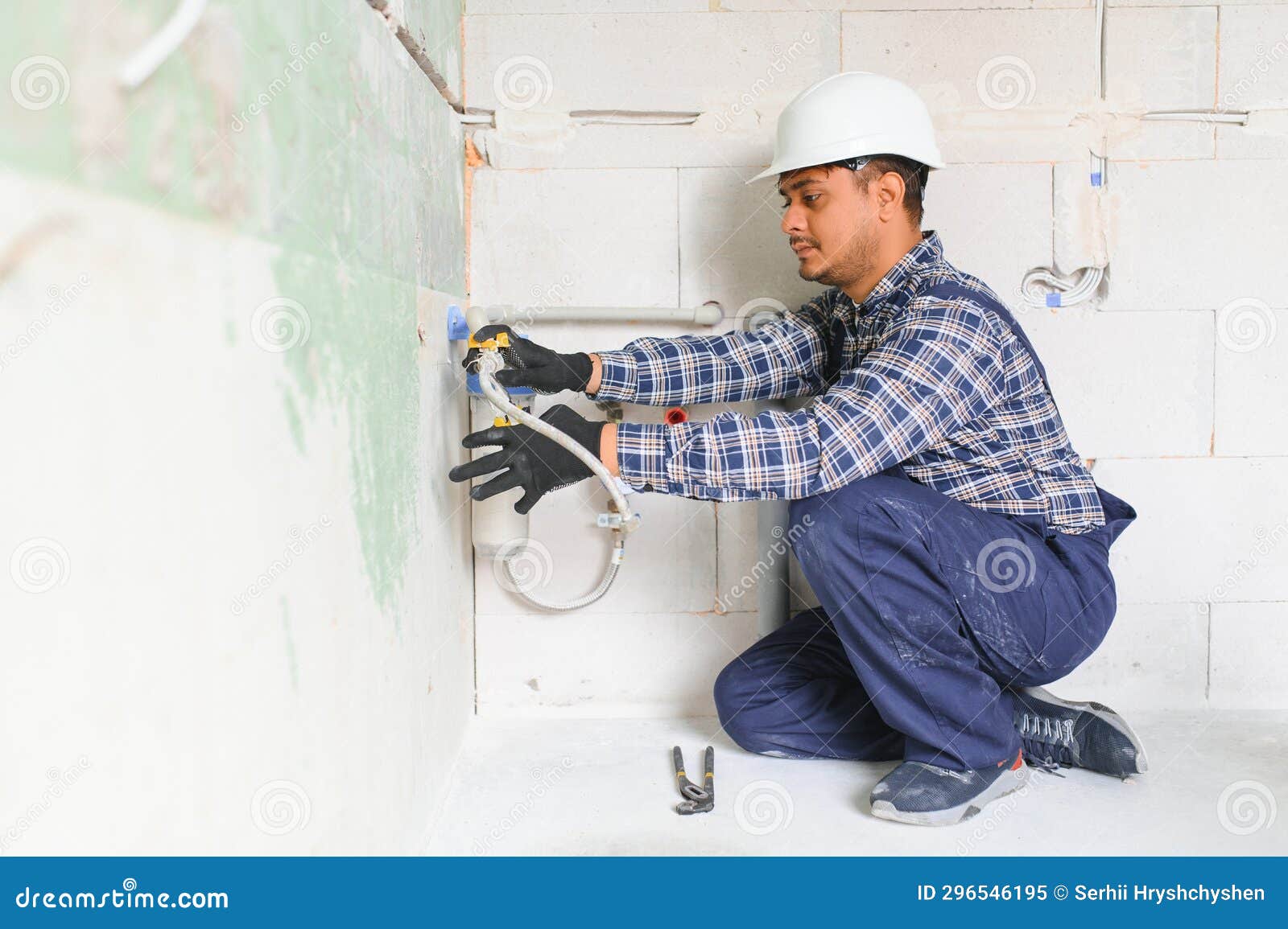 Indian Plumber Installing Water Equipment - Meter, Filter and Pressure ...