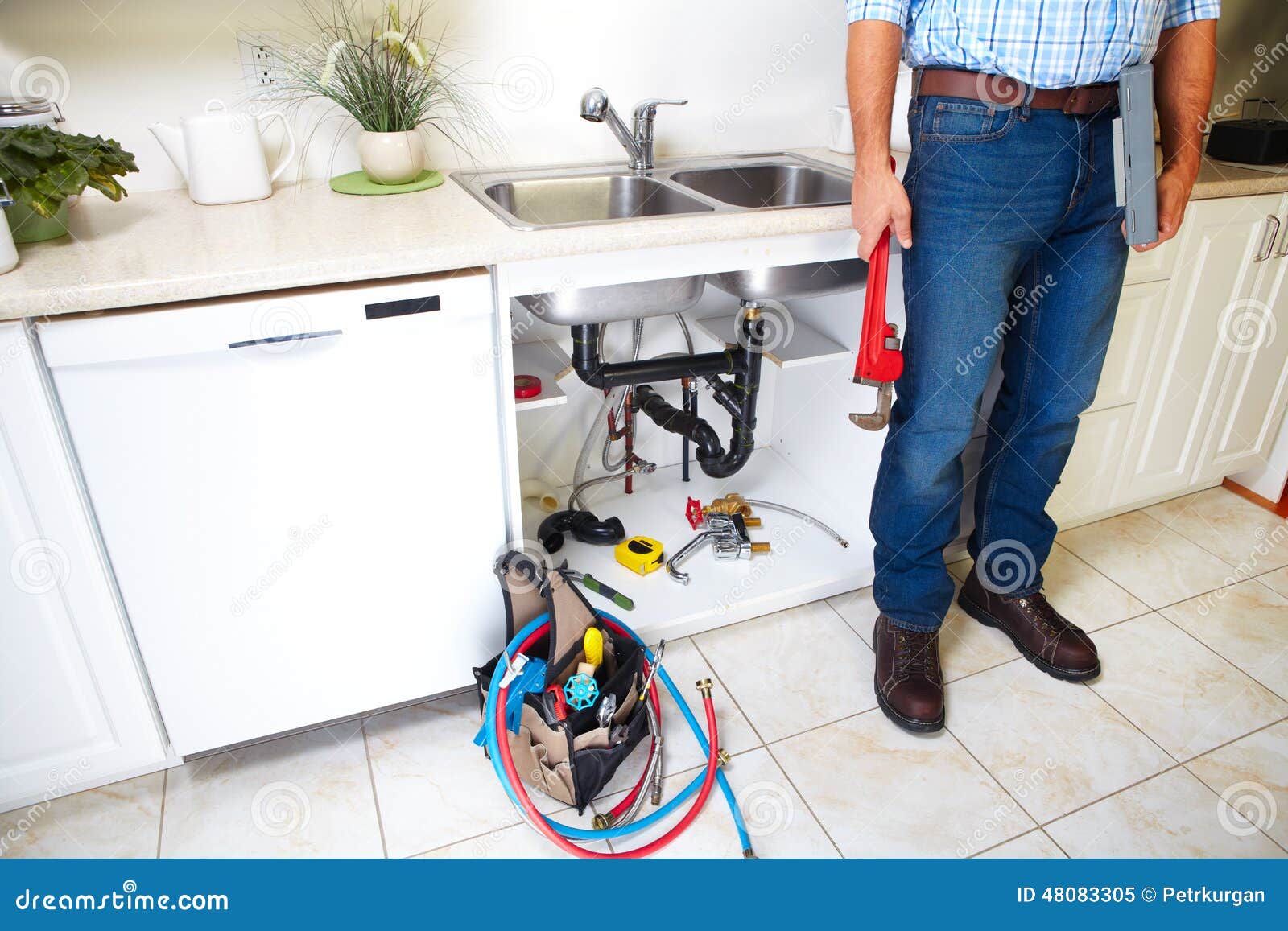 Plumber on the kitchen. stock image. Image of industry - 48083305