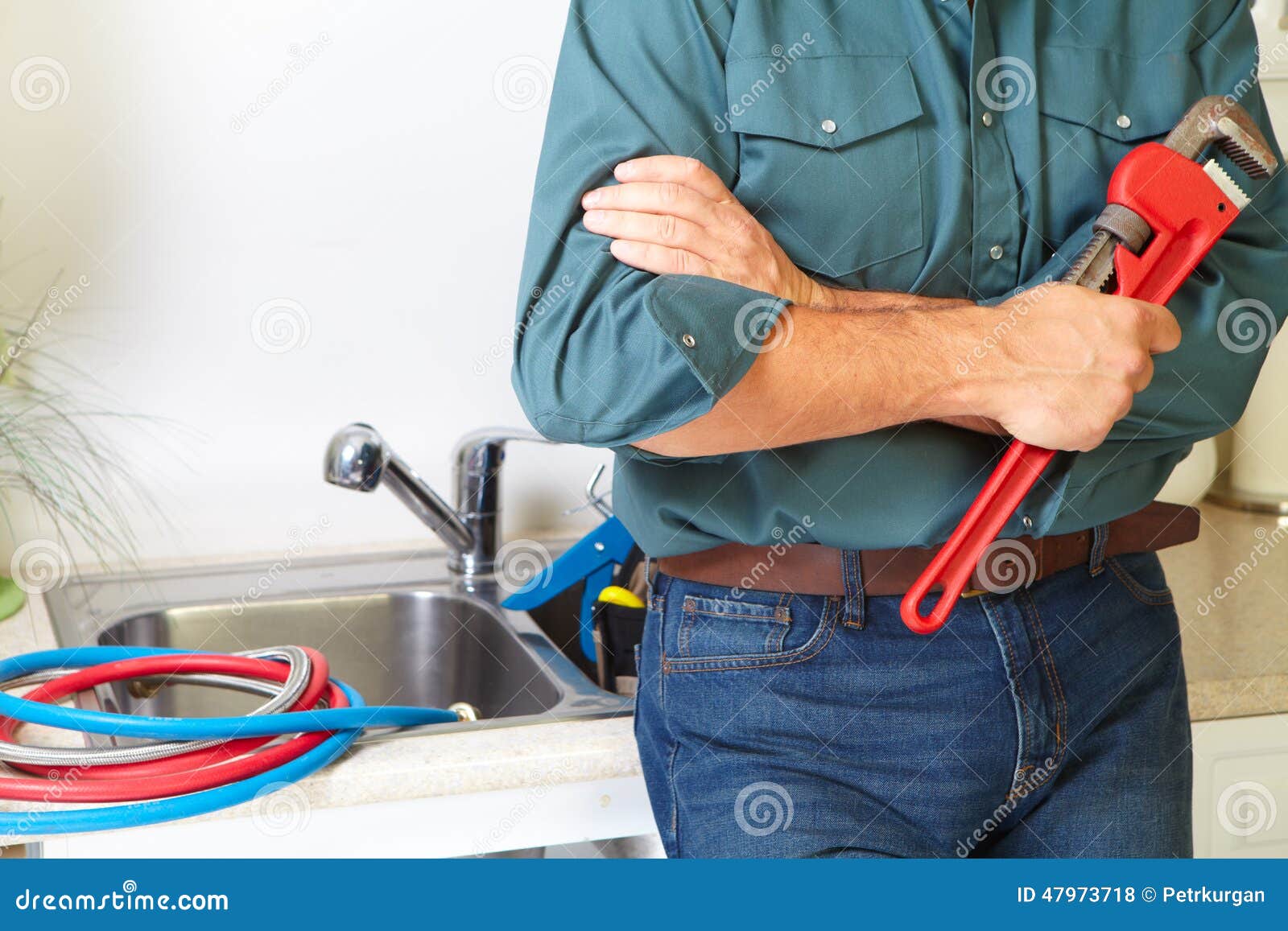 Plumber on the kitchen. stock photo. Image of male, carpenter - 47973718