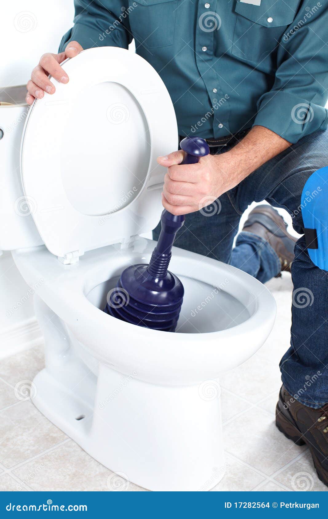 Plumber with a plunger stock photo. Image of repairman - 17282564