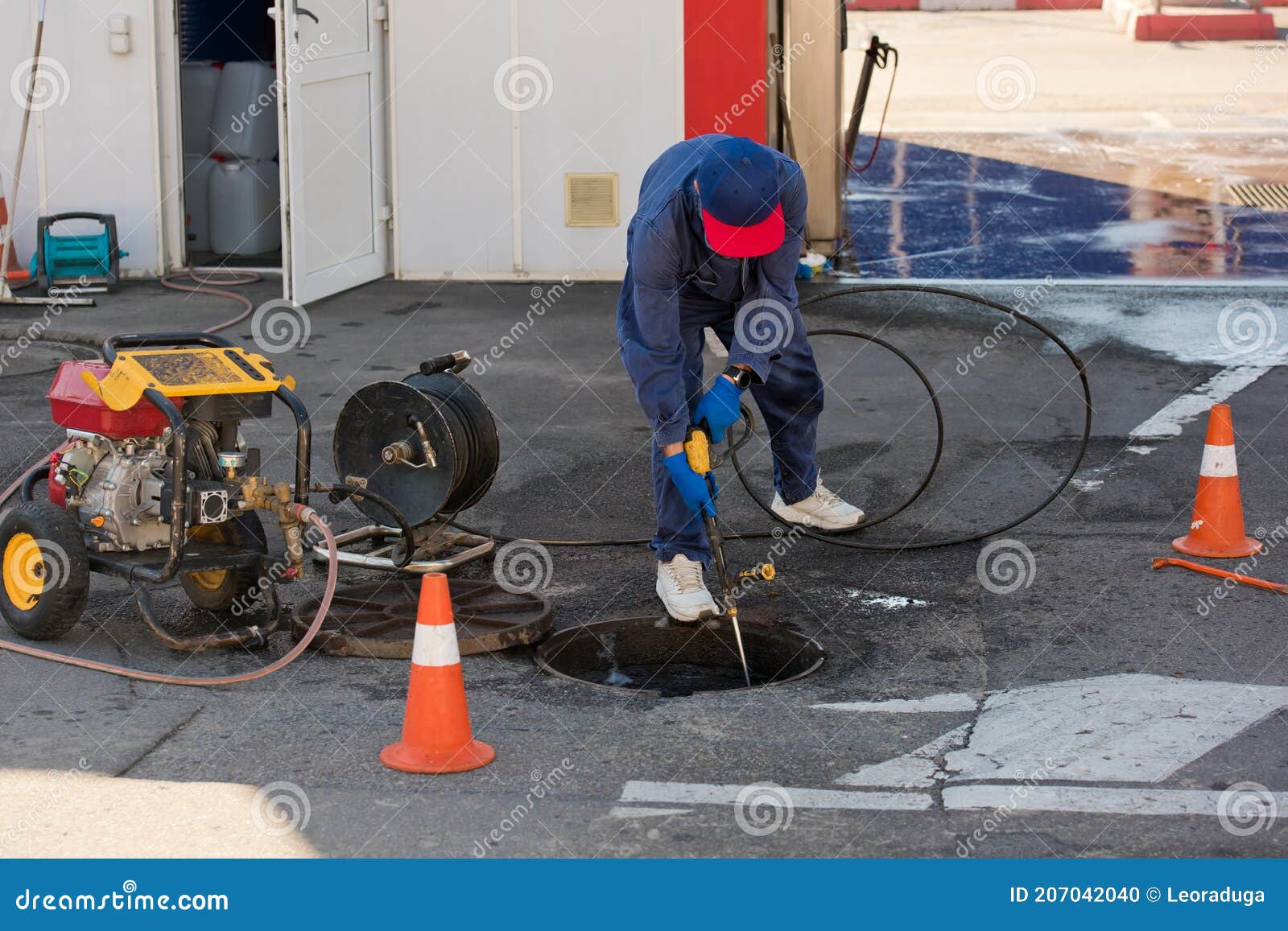 The Plumber Prepares To Fix the Problem in the Sewer. Repair Work on ...