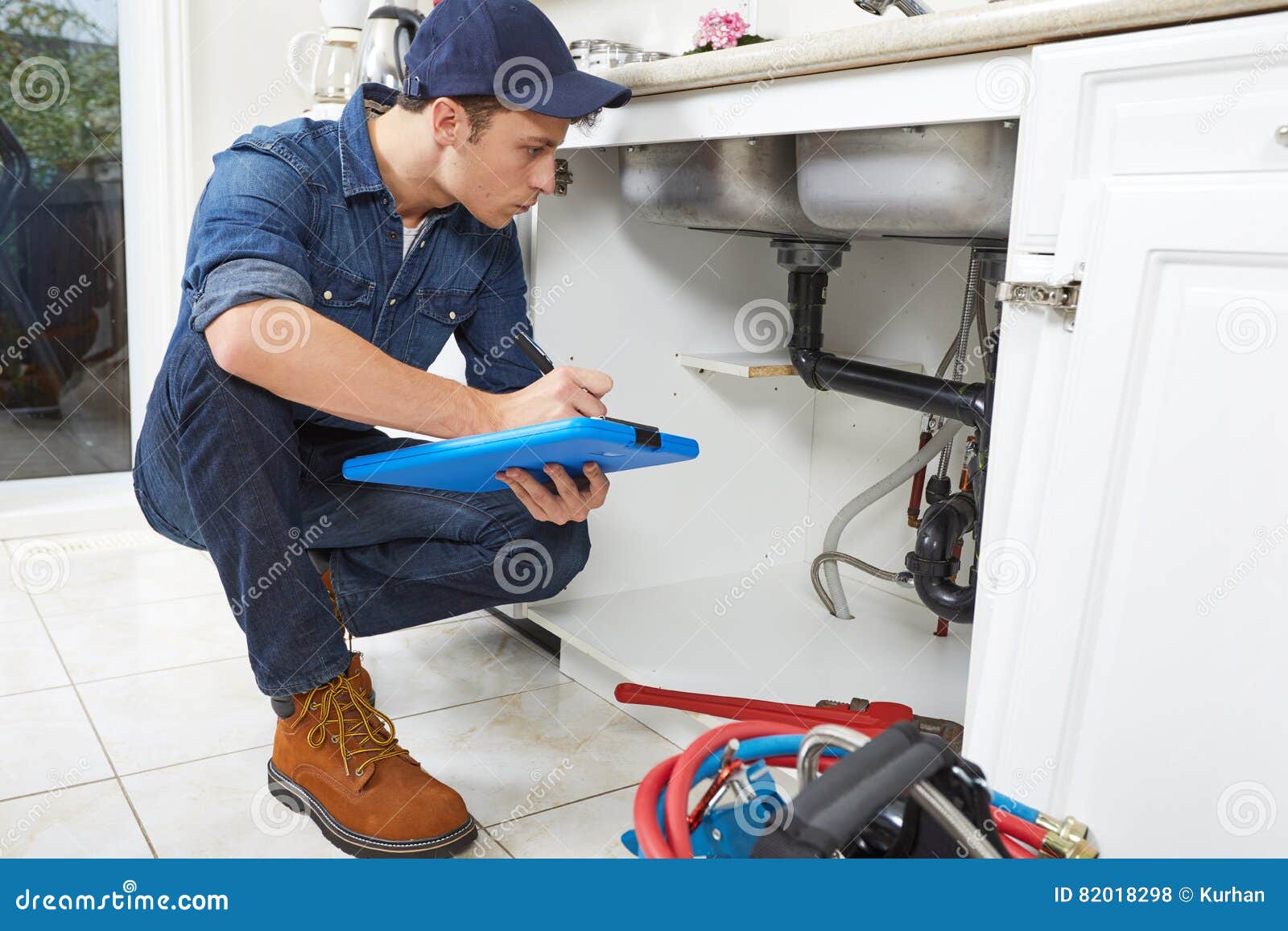 Plumber. stock photo. Image of leakage, people, help - 82018298