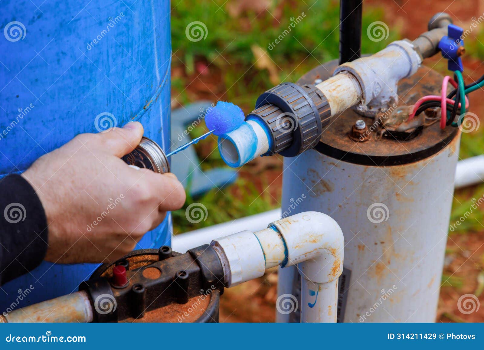 Plumber Putting Glue on a Pvc Pipe before Gluing Stock Image - Image of ...