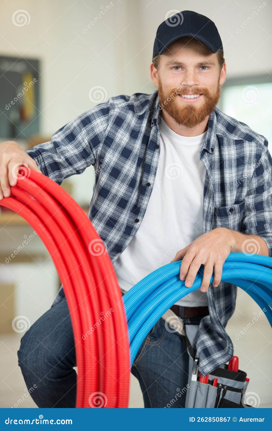 Plumber with Reels Blue and Red Cabling Stock Image - Image of bending ...