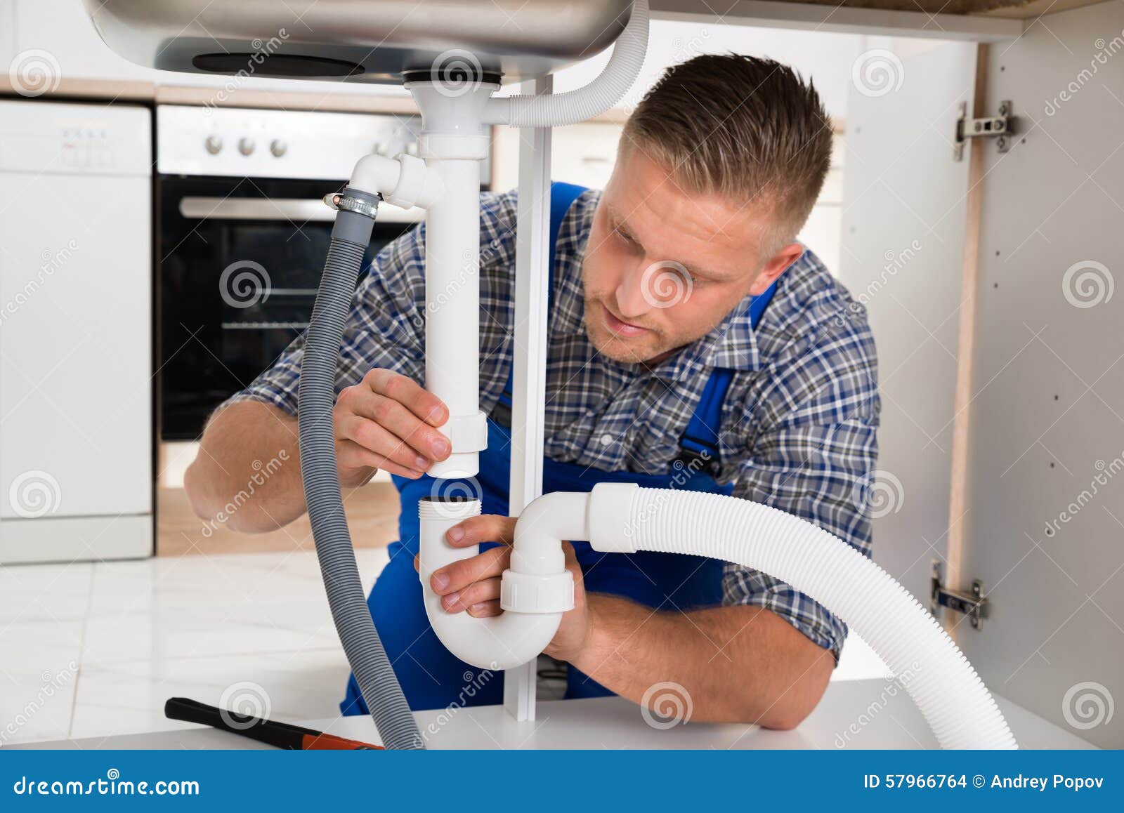 Plumber Repairing Pipe of Sink Stock Photo - Image of occupation ...