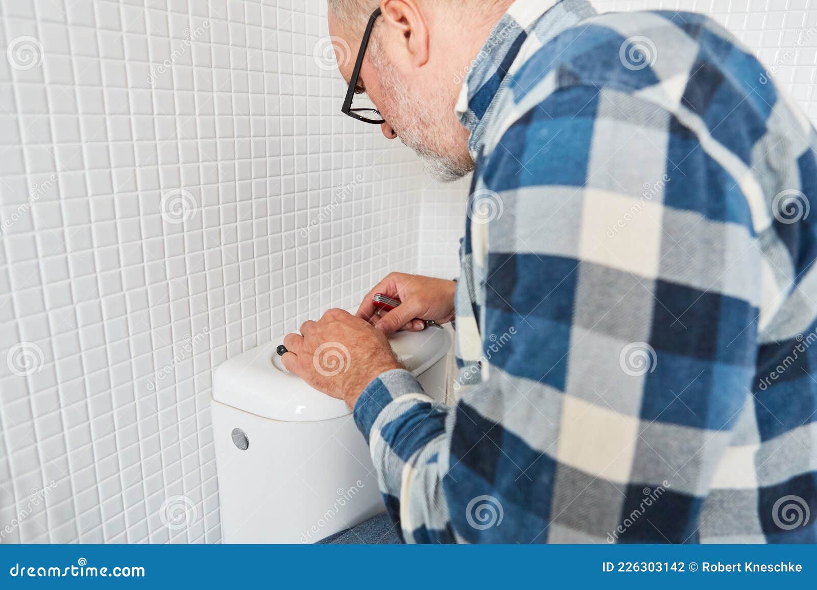 Plumber Repairs Broken Toilet Flush Stock Photo - Image of copy ...