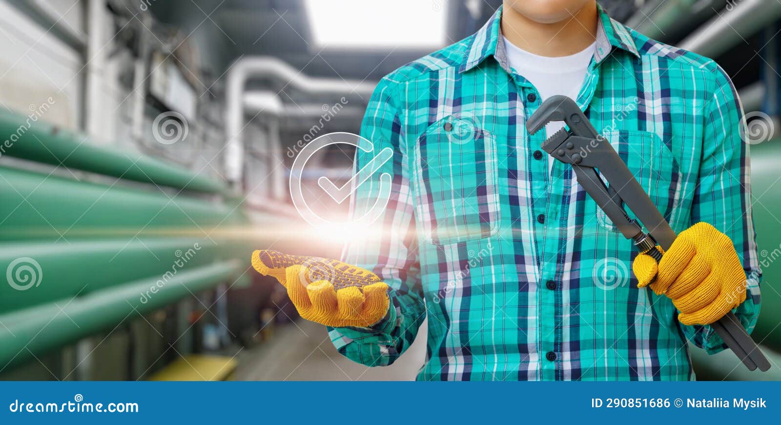 Plumber Showing Thumbs Up Sign By Holding Drilling Machine At ...