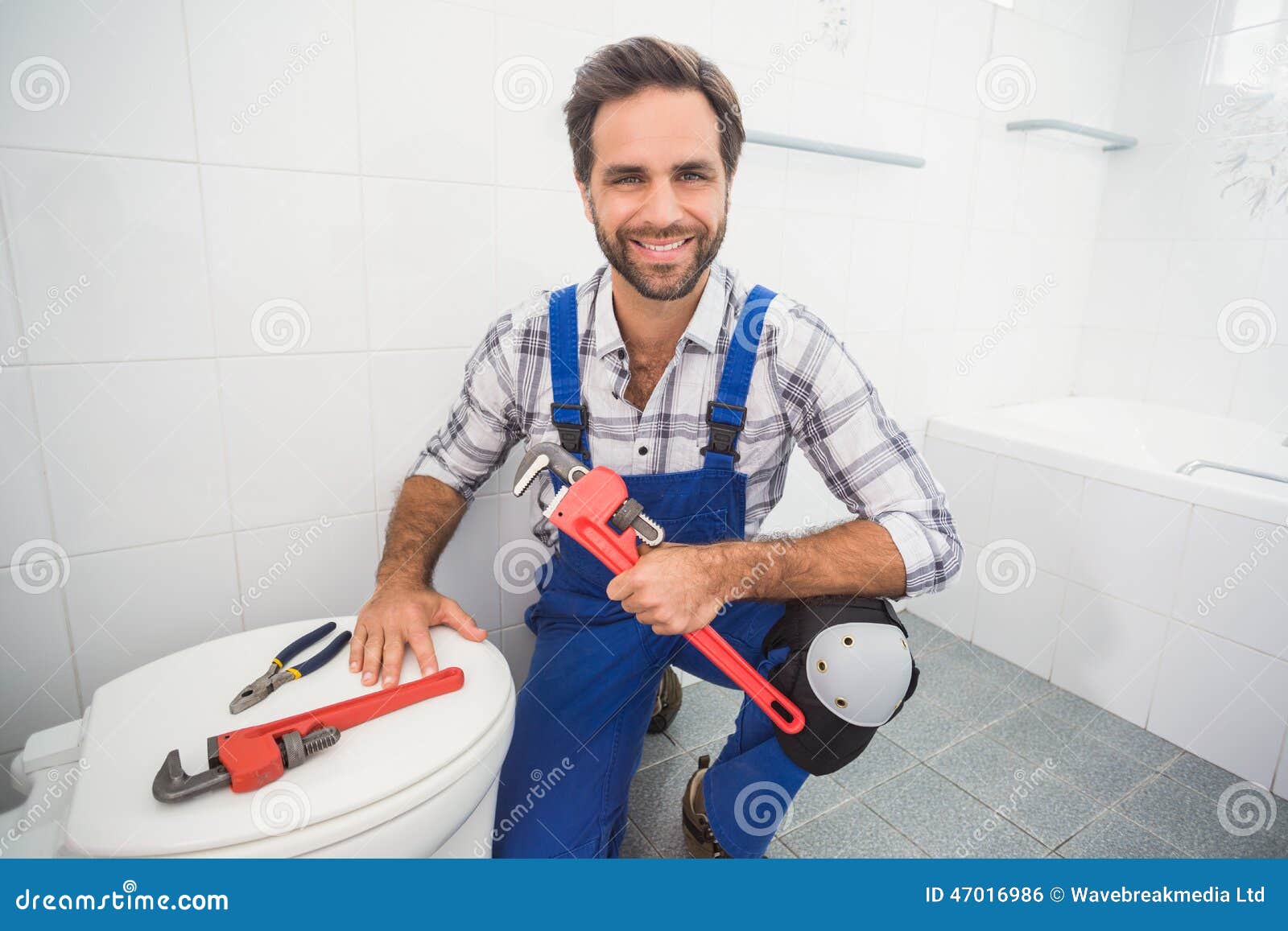 Plumber Smiling at the Camera Stock Photo - Image of plumbing, stone ...