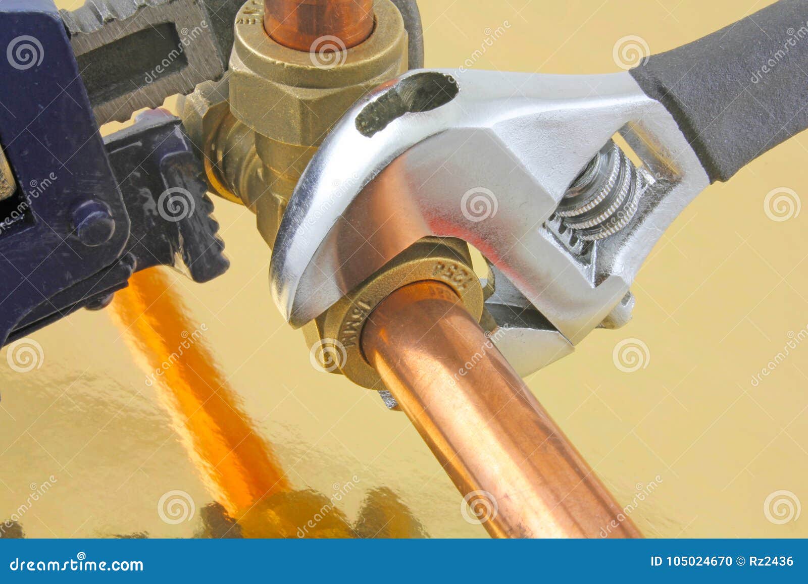 Plumber Tightening Up Pipework Stock Photo - Image of industrial ...