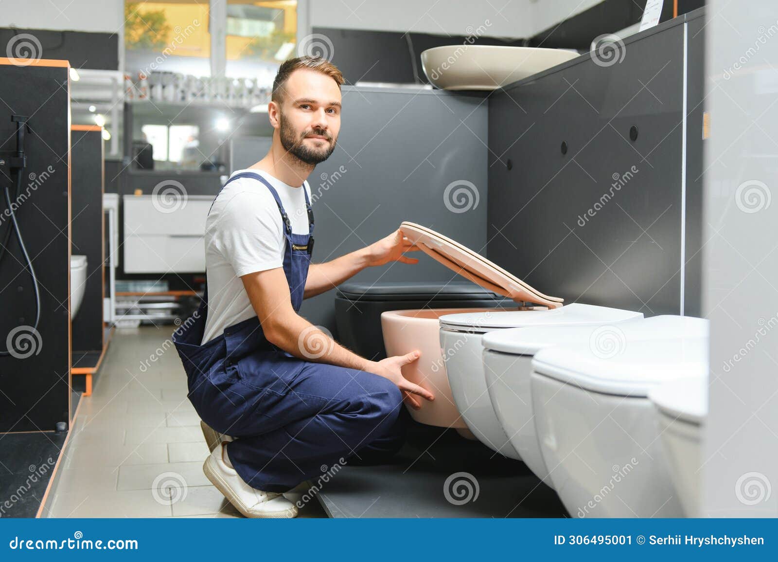 Plumber in Uniform at Showcase in Plumbering Store Stock Image - Image ...
