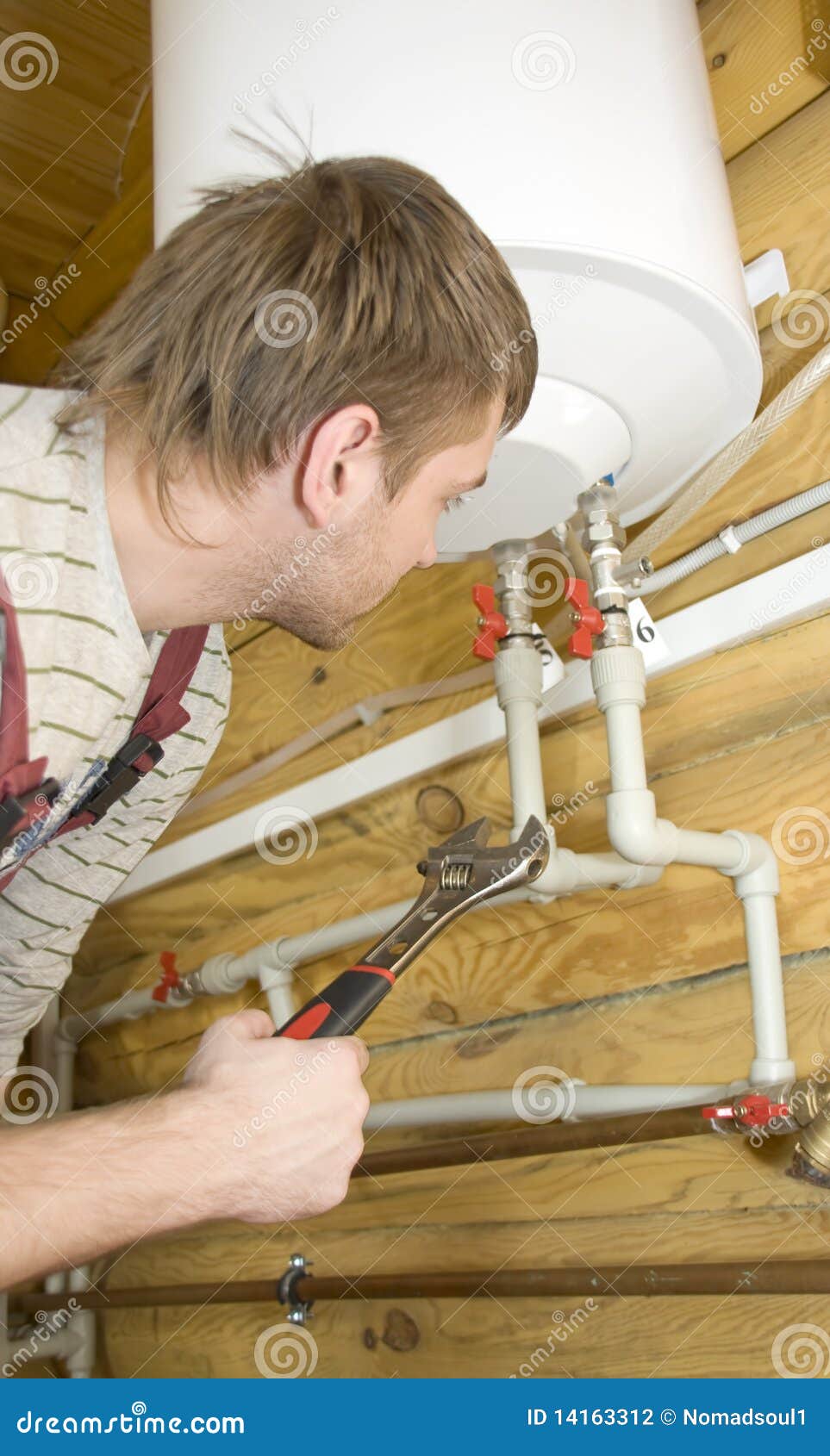 Plumber at work stock photo. Image of contractor, improvement - 14163312
