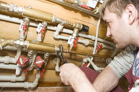 Plumber at work stock image. Image of plumber, interior - 14163315