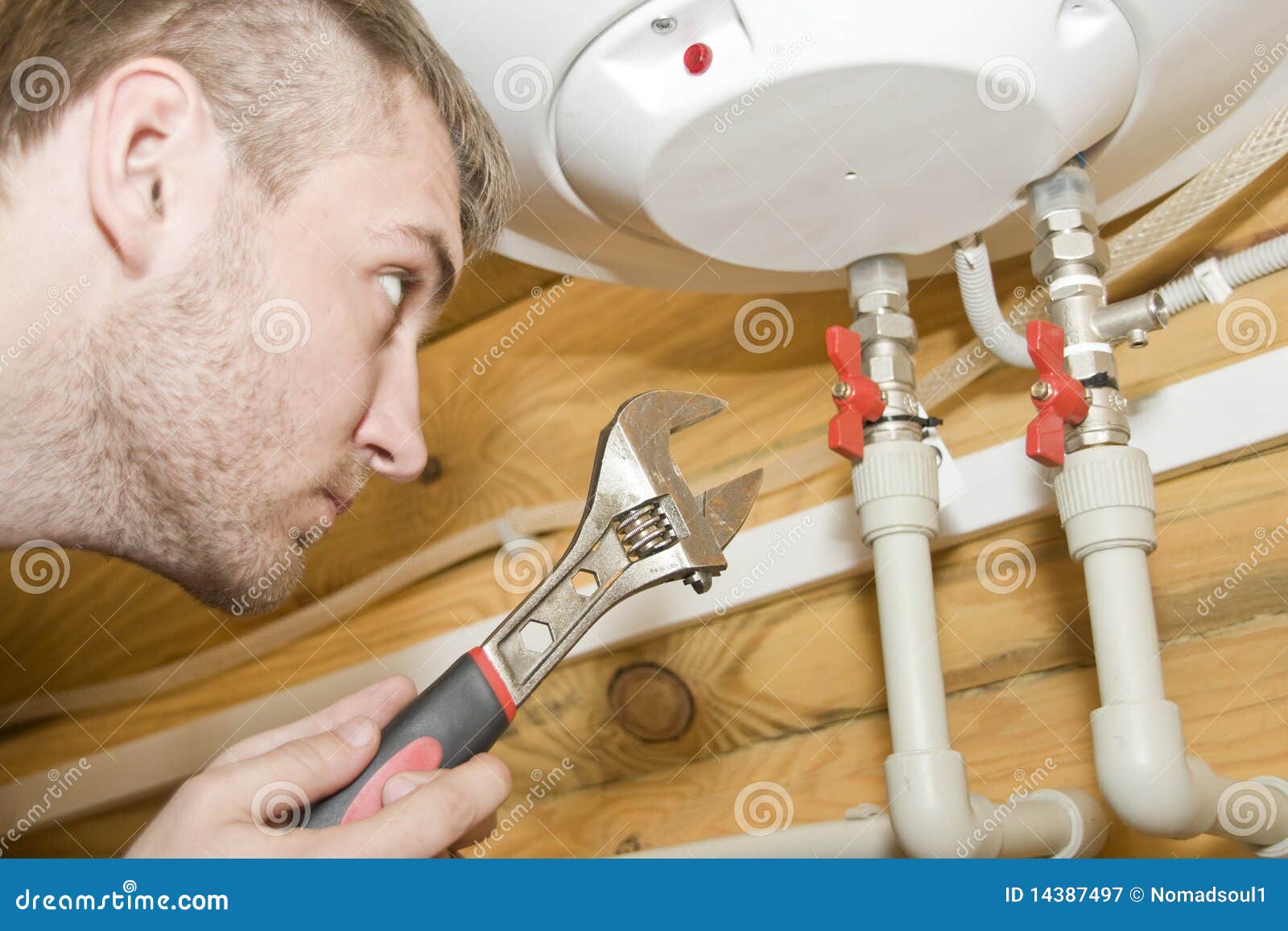 Plumber at work stock image. Image of installing, equipment - 14387497