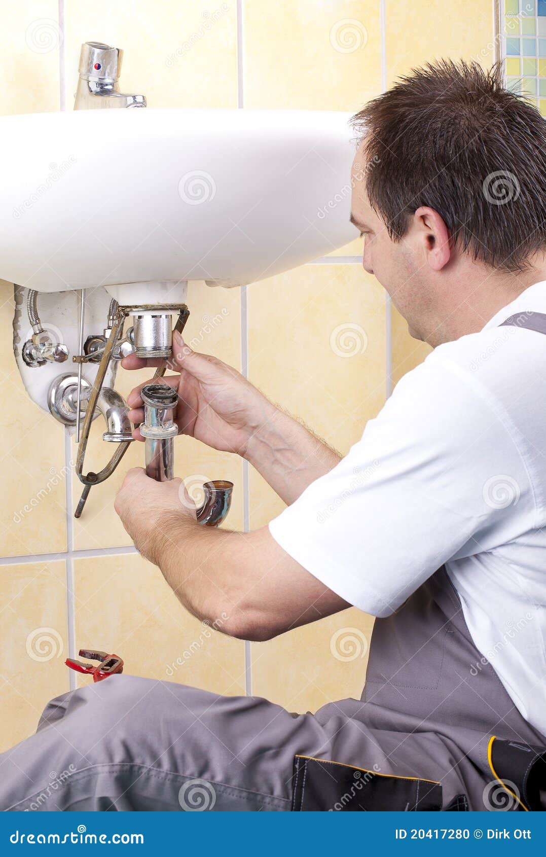 Plumber at work stock photo. Image of equipment, occupation - 20417280