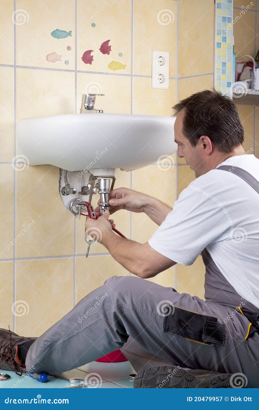 Plumber at work stock image. Image of male, construction - 20479957