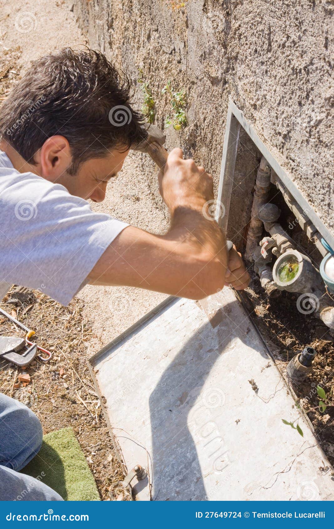 Plumber at work stock photo. Image of plumbing, industrial - 27649724
