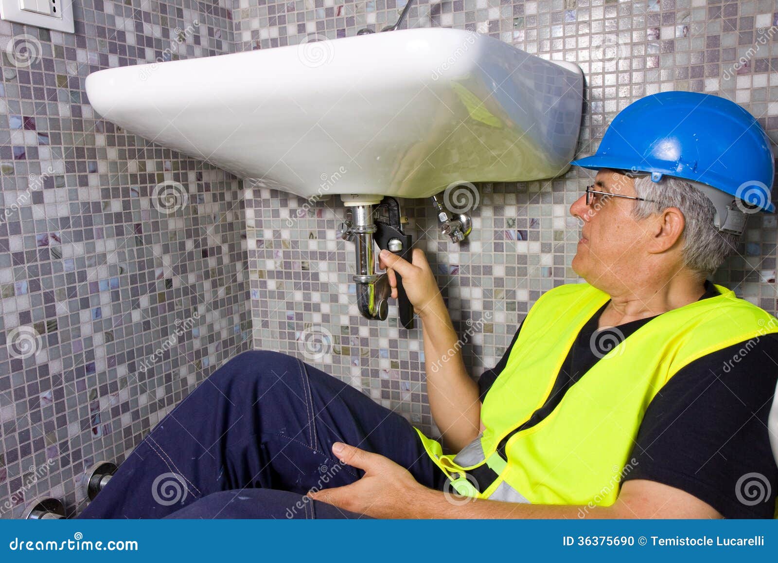 Plumber at work stock photo. Image of masonry, builder - 36375690