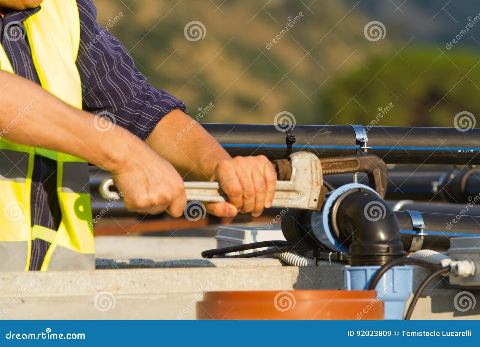 Plumber at work stock image. Image of pipes, pump, laborer - 92023809