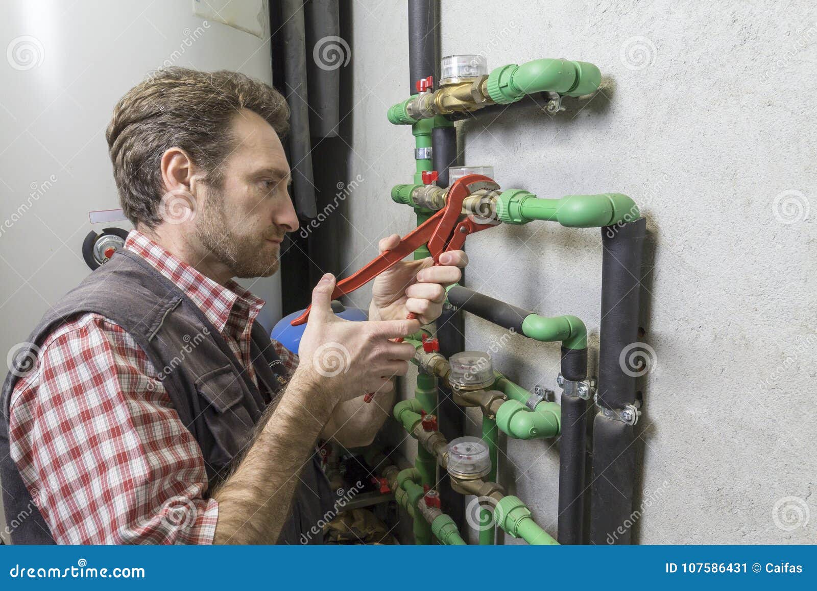 Plumber at Work Installing a Water Meter Stock Image - Image of iron ...