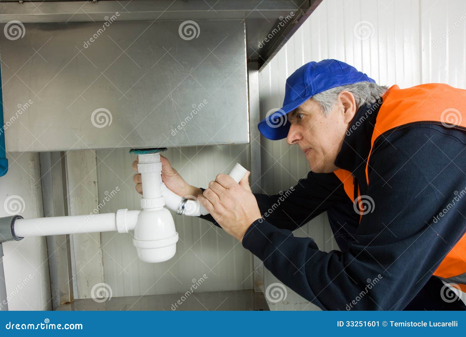 Plumber at work stock image. Image of installing, industry - 33251601