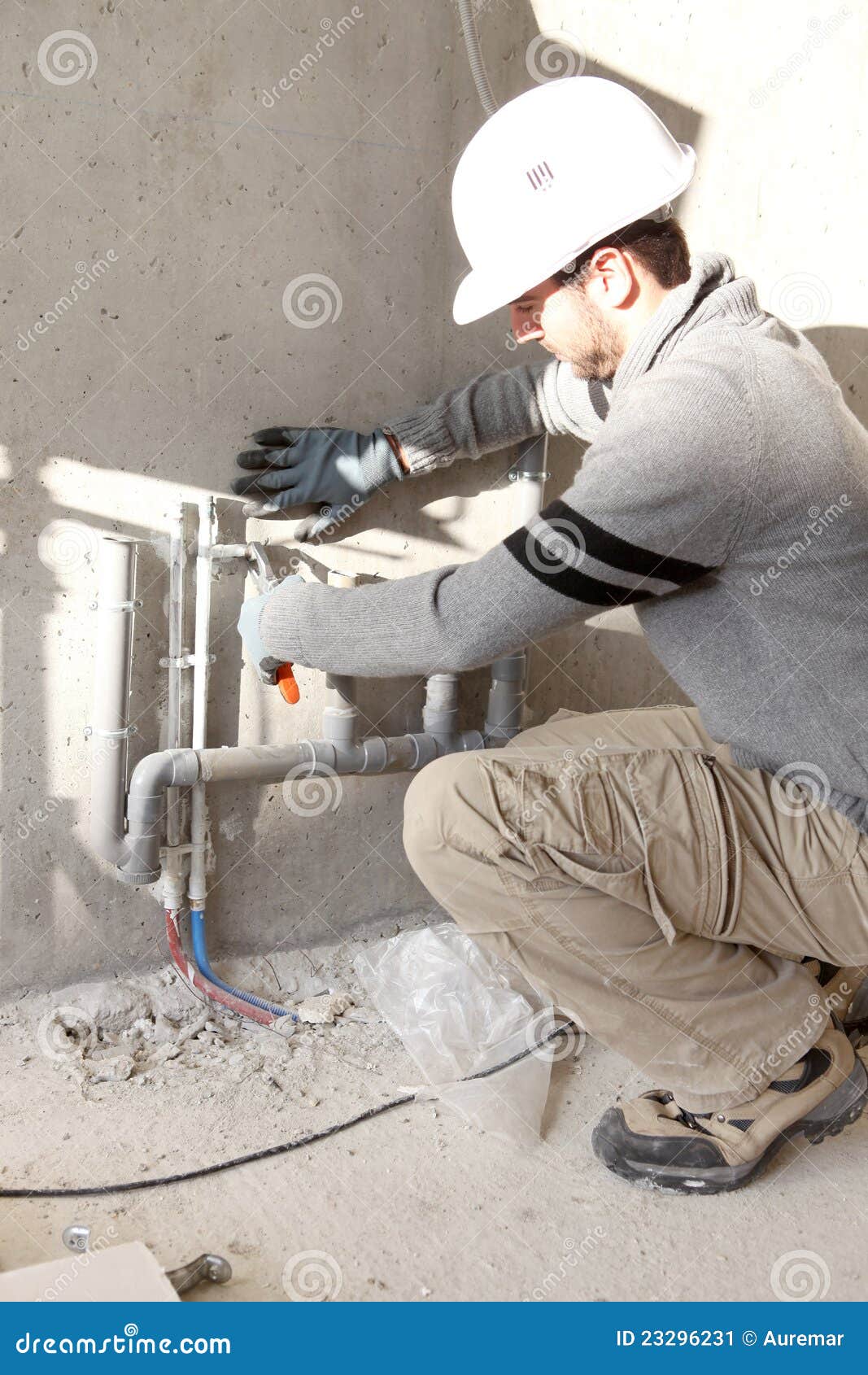 Plumber at work outdoors stock image. Image of jumper - 23296231
