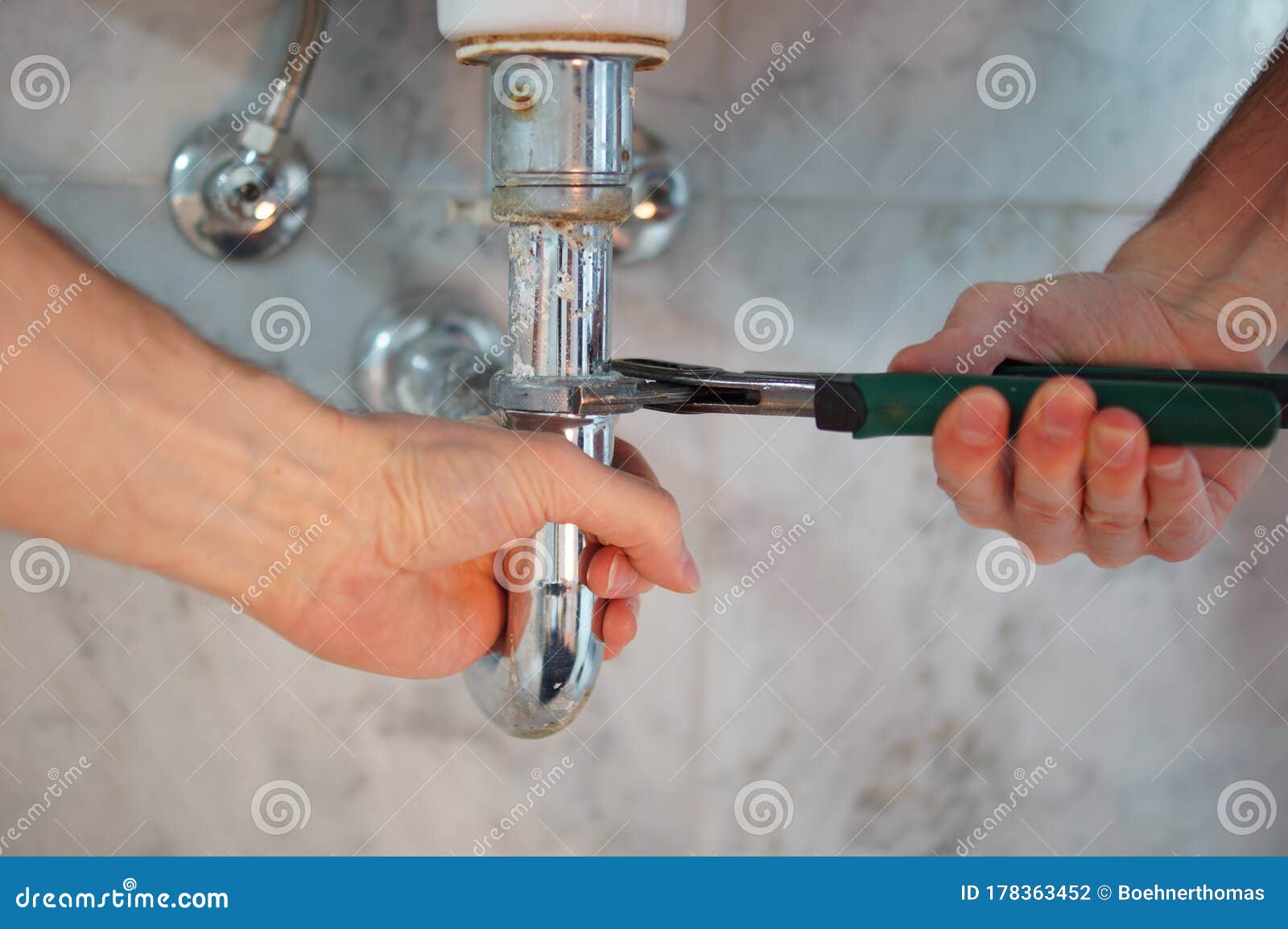 A plumber at work. stock photo. Image of expert, house - 178363452