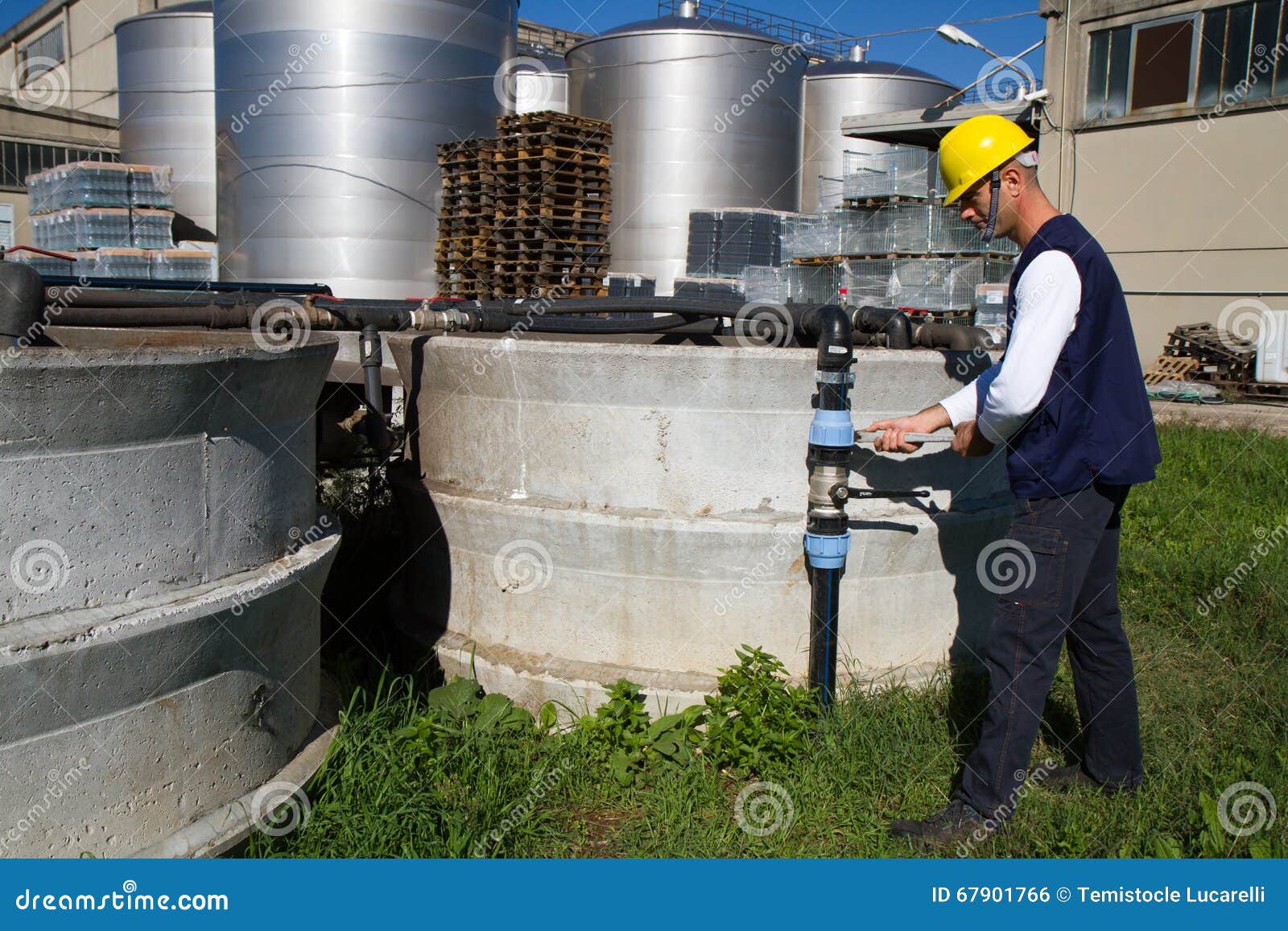 Plumber at work in a site stock photo. Image of masonry - 67901766