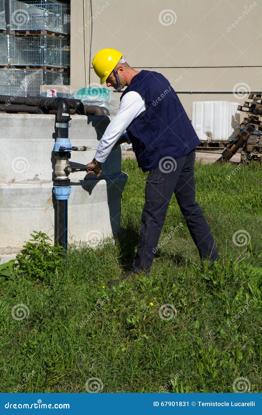 Plumber at work in a site stock image. Image of laborer - 67901831