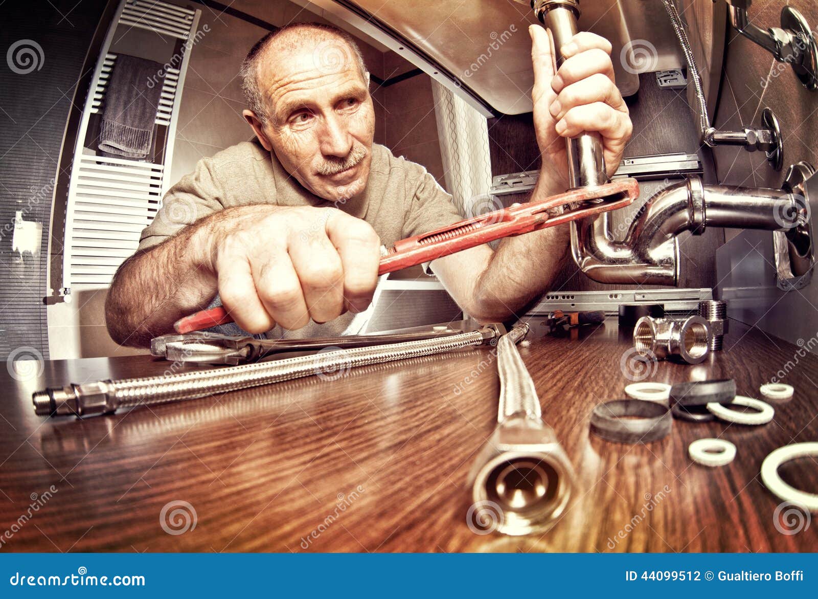 Plumber at work stock photo. Image of senior, person - 44099512