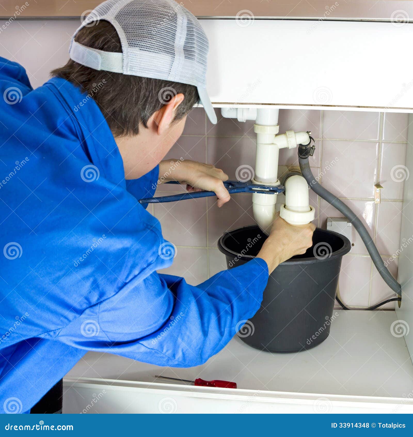 Plumber at work stock photo. Image of sink, pipe, pipes - 33914348