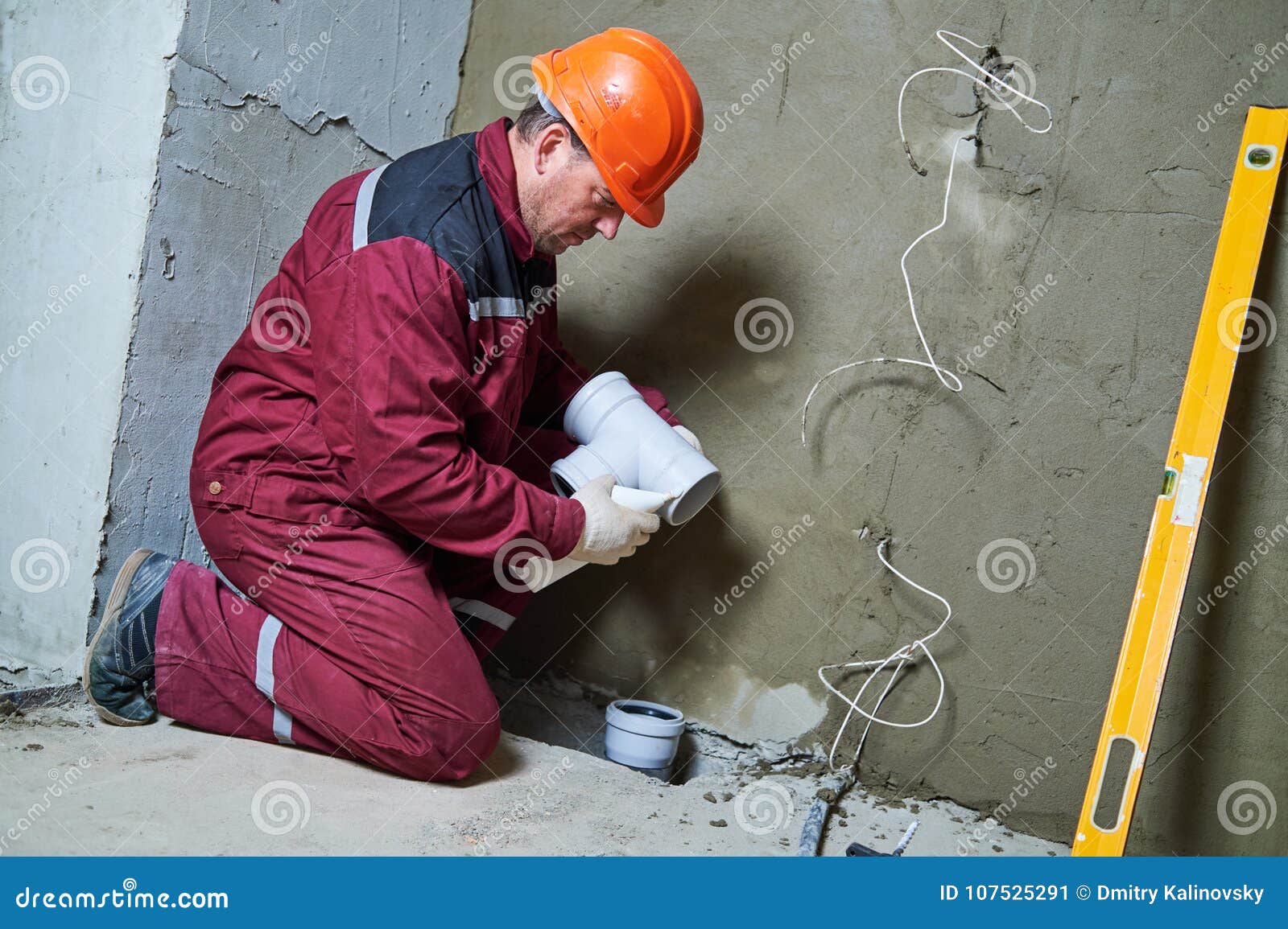 Plumber Worker Installing Sewage Pipes in Sewerage System Stock Image ...
