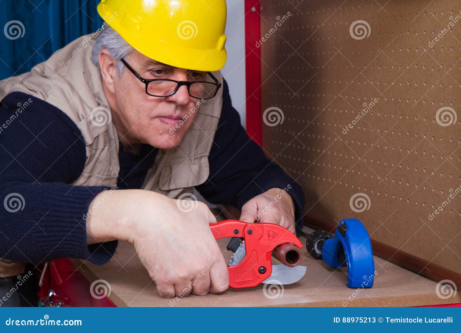 Plumber working with pipes stock image. Image of contractor - 88975213