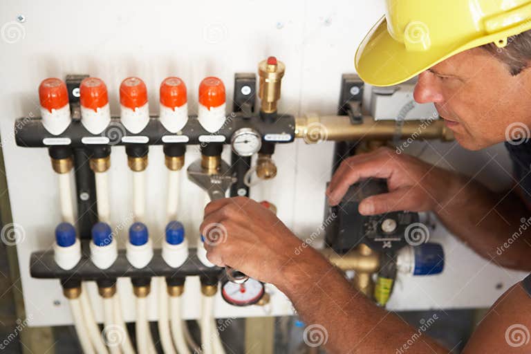 Plumber Working on Pipework Stock Photo - Image of aged, builder: 16295302