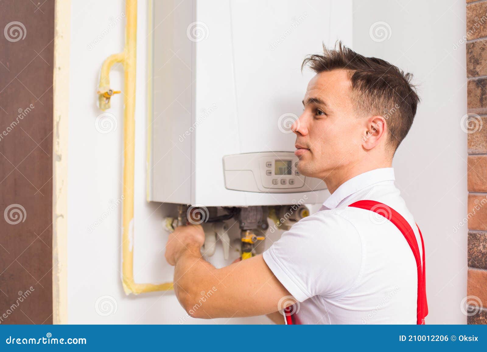 The Plumber Works with Boiler at the Kitchen Stock Photo - Image of ...