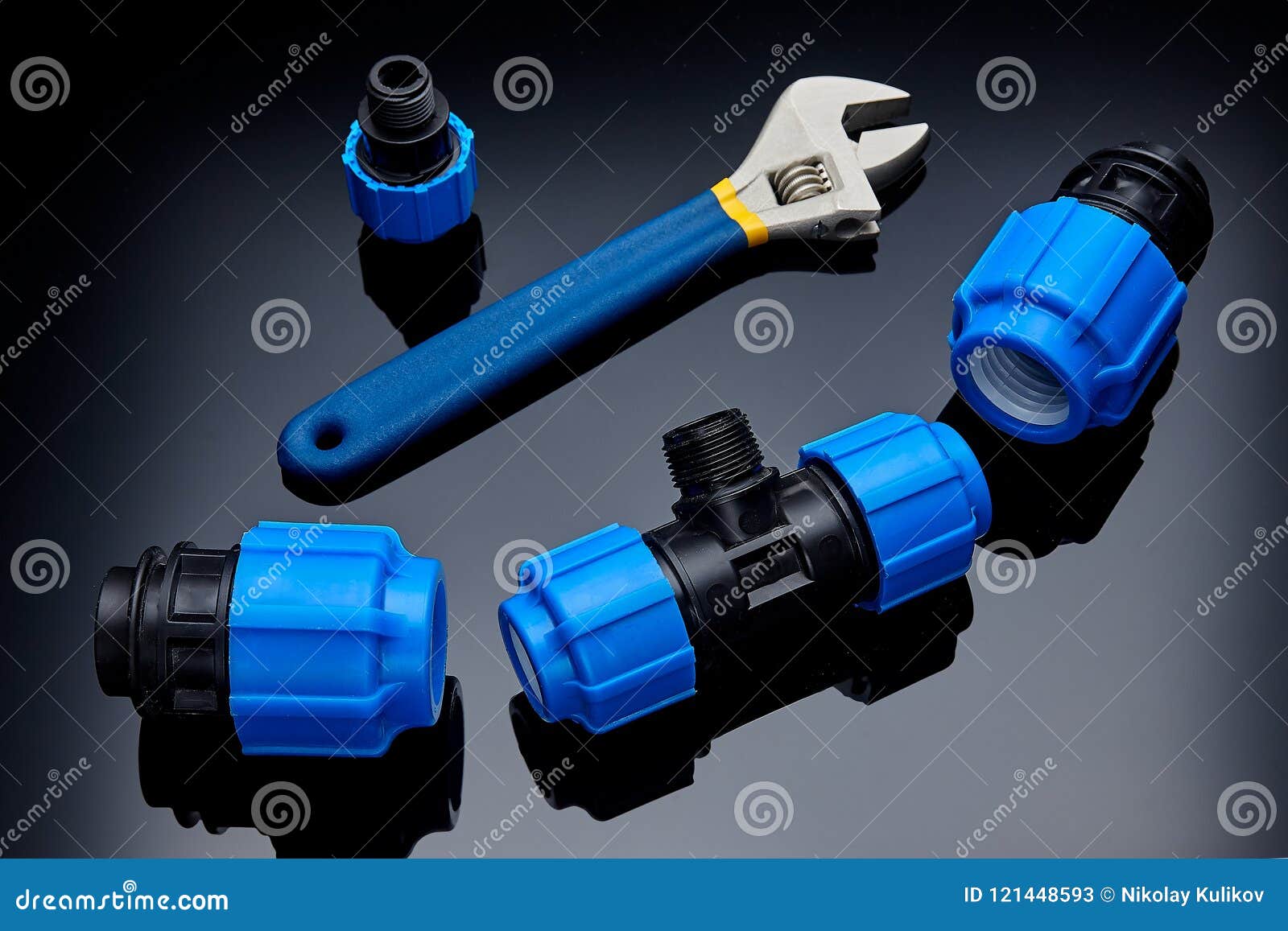 Plumbing Accessories on Textured Dark Background. Stock Image - Image ...