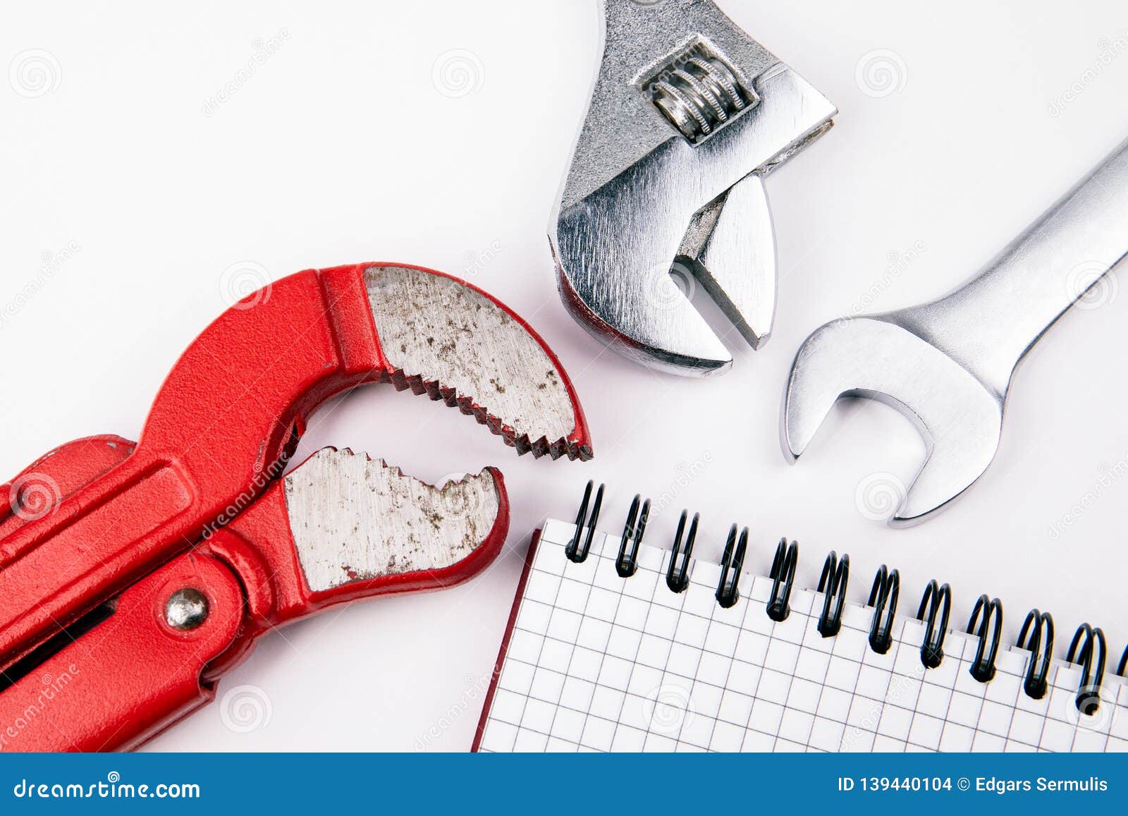 Plumbing Key with a Notepad on a White Background Stock Photo - Image ...