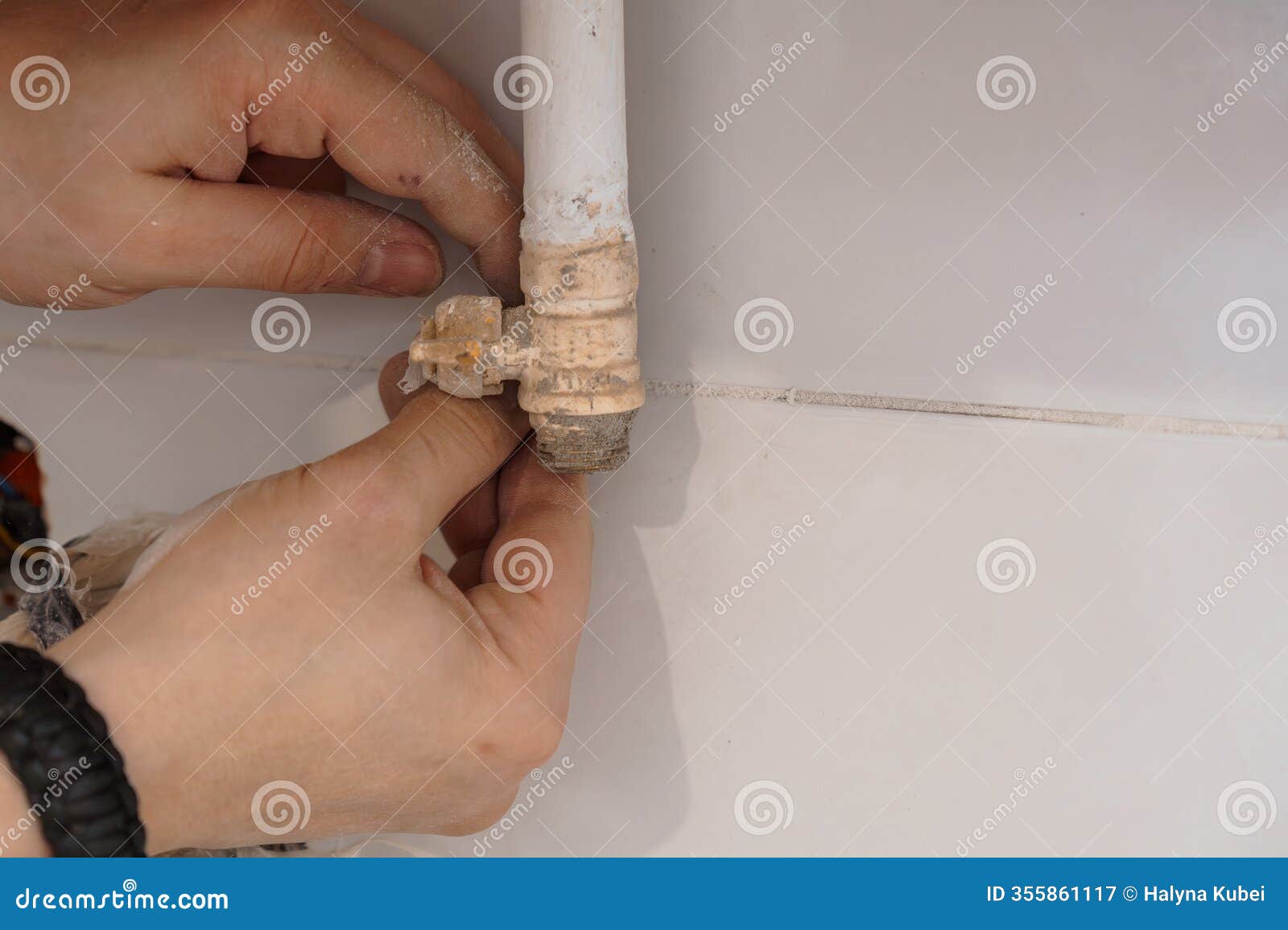 Plumbing Repair: Fixing a Leaking Pipe Fitting in a Kitchen Stock Image ...
