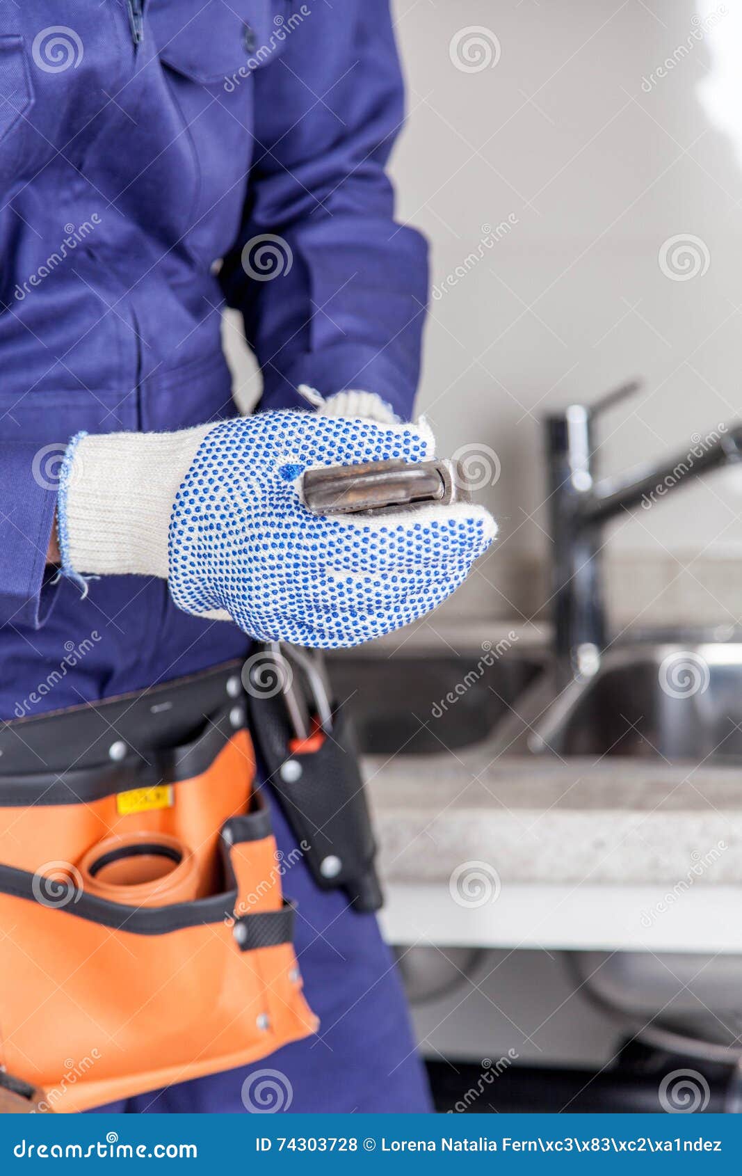 Plumbing tool stock photo. Image of hands, spanner, blue - 74303728
