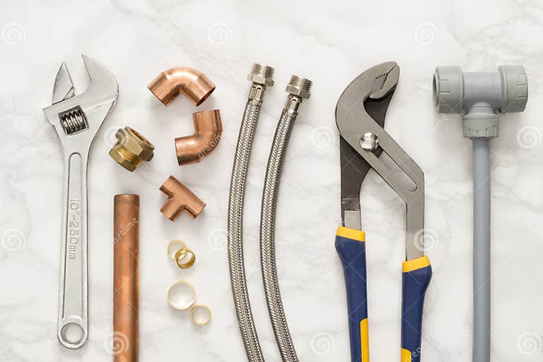 Plumbing Tools and Materials on Marble Background Stock Photo - Image ...