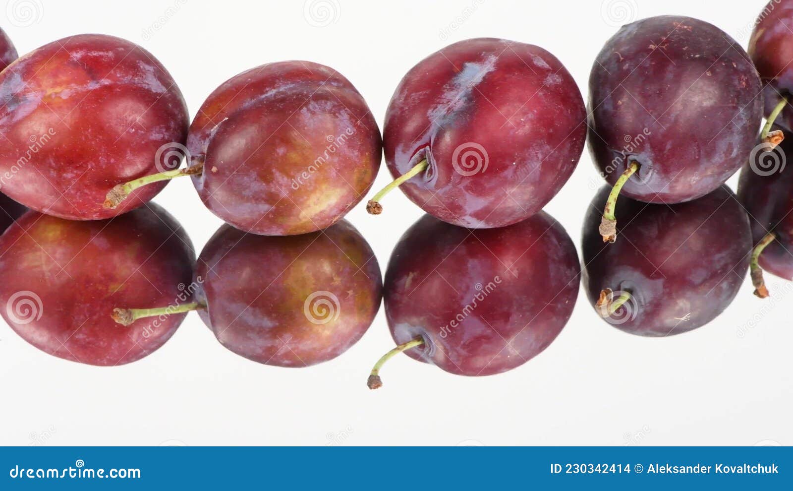 Plums in a Row on Mirror. Side View. Loop Motion. Rotation 360 Stock ...