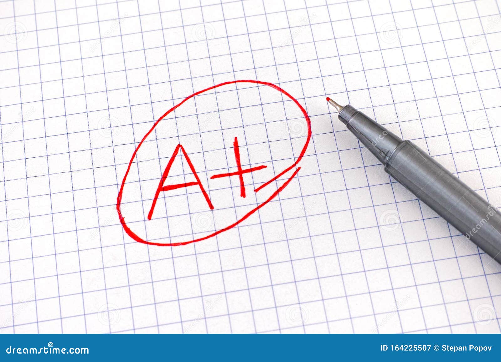 A Plus a+ Grade on Notebook Paper Sheet Stock Image - Image of school ...