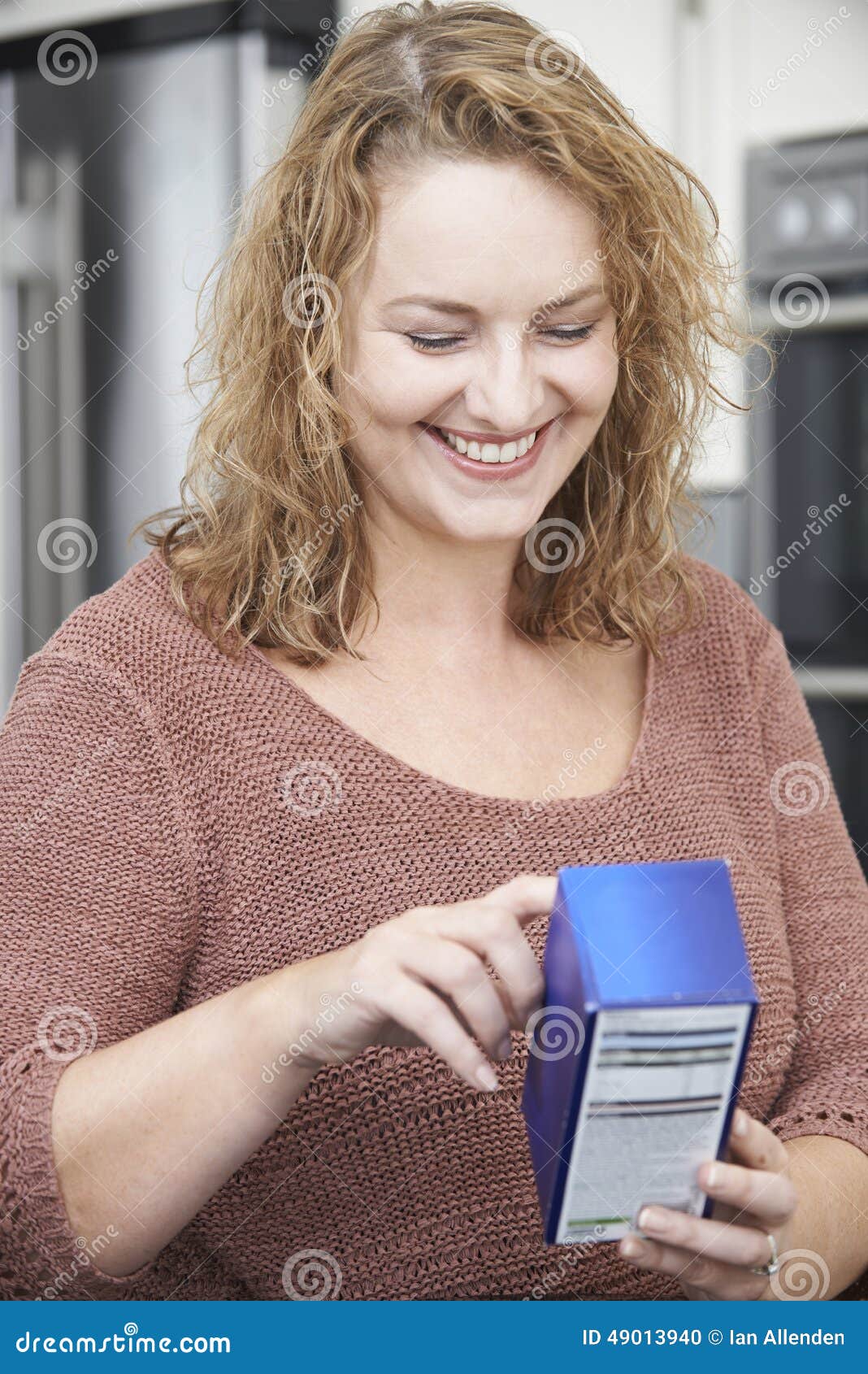 Plus Size Female Reading Nutritional Information on Packet Stock Photo ...