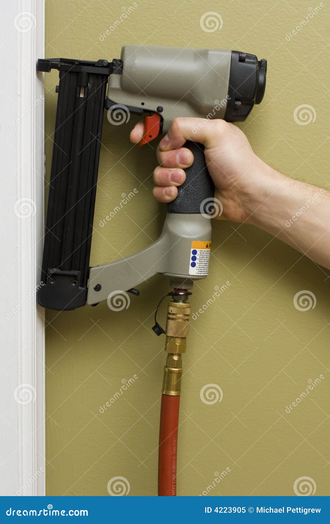 Pneumatic nailer stock image. Image of improvements, green - 4223905