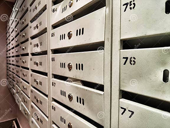 PO Boxes for Rent in Rows with Metallic Silver Doors and Numbers ...