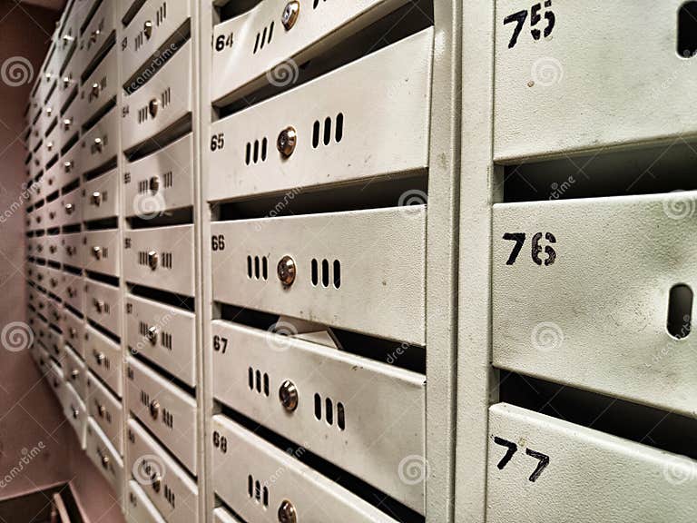 PO Boxes for Rent in Rows with Metallic Silver Doors and Numbers ...